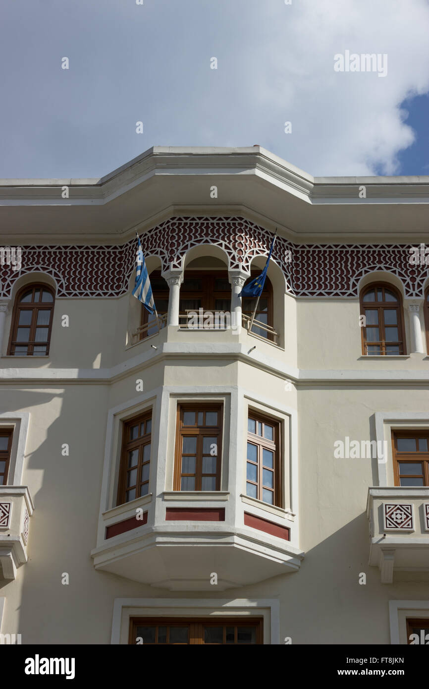 Greek neoclassical plaster cast ornament patterns above windows of a ...
