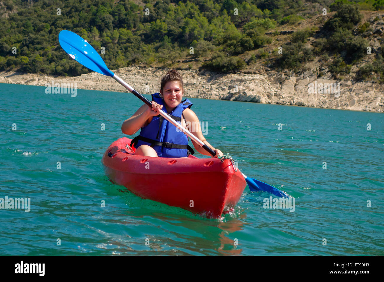 Smiling woman in a kayak hi-res stock photography and images - Alamy