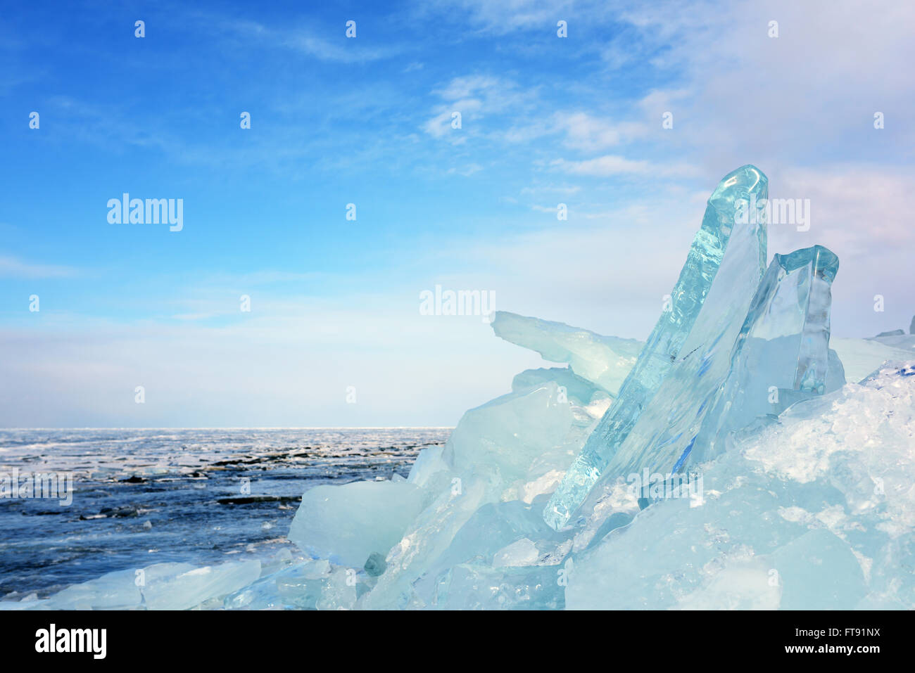 Transparent blue ice formation on the frozen lake Stock Photo - Alamy