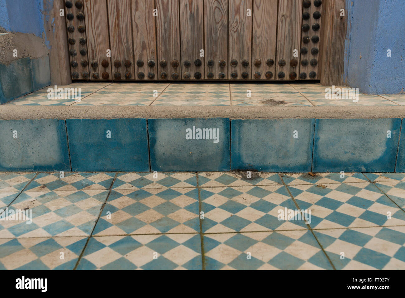 blue tiled steps and door Stock Photo - Alamy