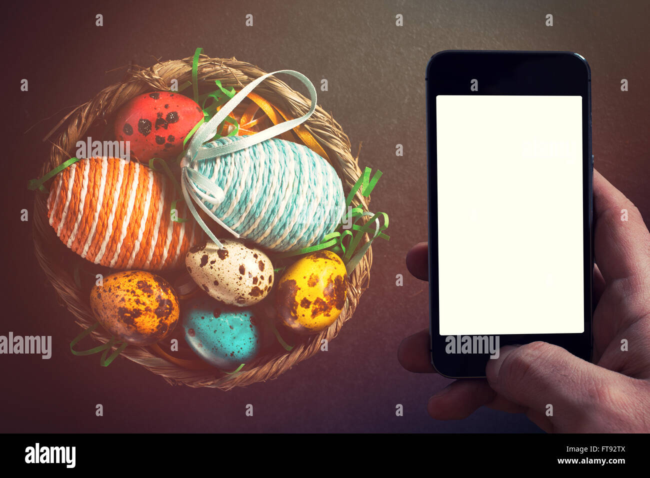 Colorful Easter eggs from above on dark background with blank space on ...