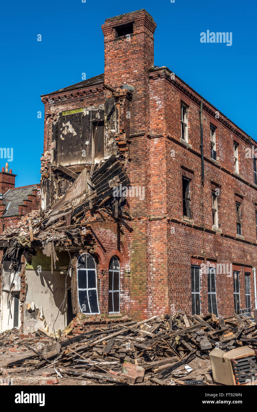 An old building being demolished following fire damage Stock Photo - Alamy