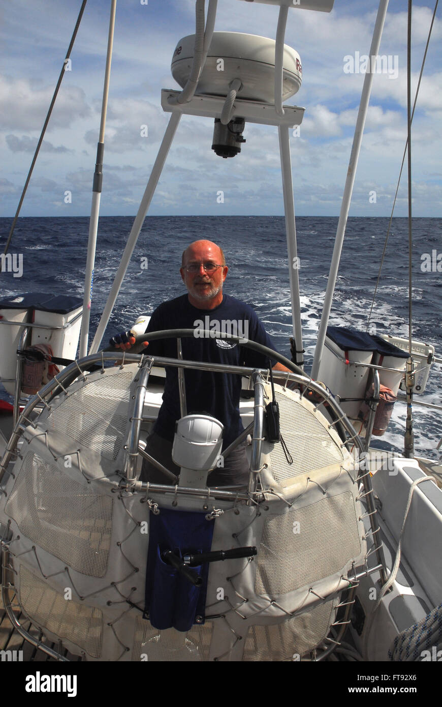 At the helm, Atlantic crossing, ARC Stock Photo - Alamy