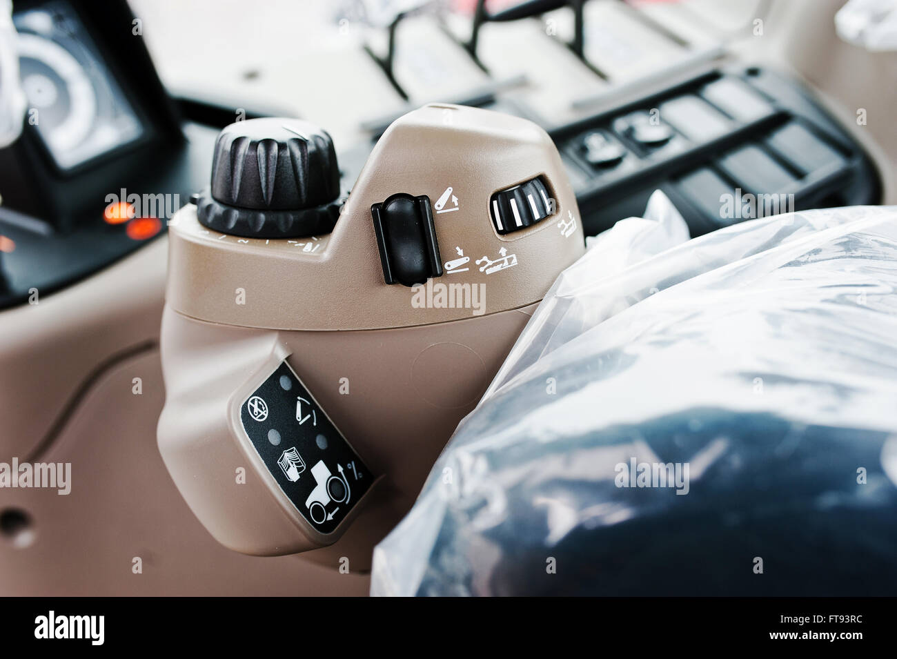 Controls panel in the cabin of the new tractor Stock Photo - Alamy