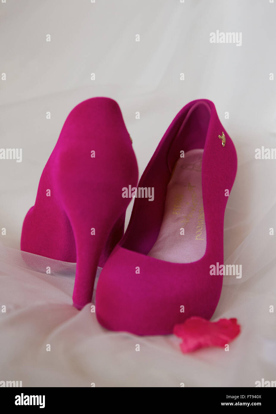 Pink suede heels Stock Photo - Alamy