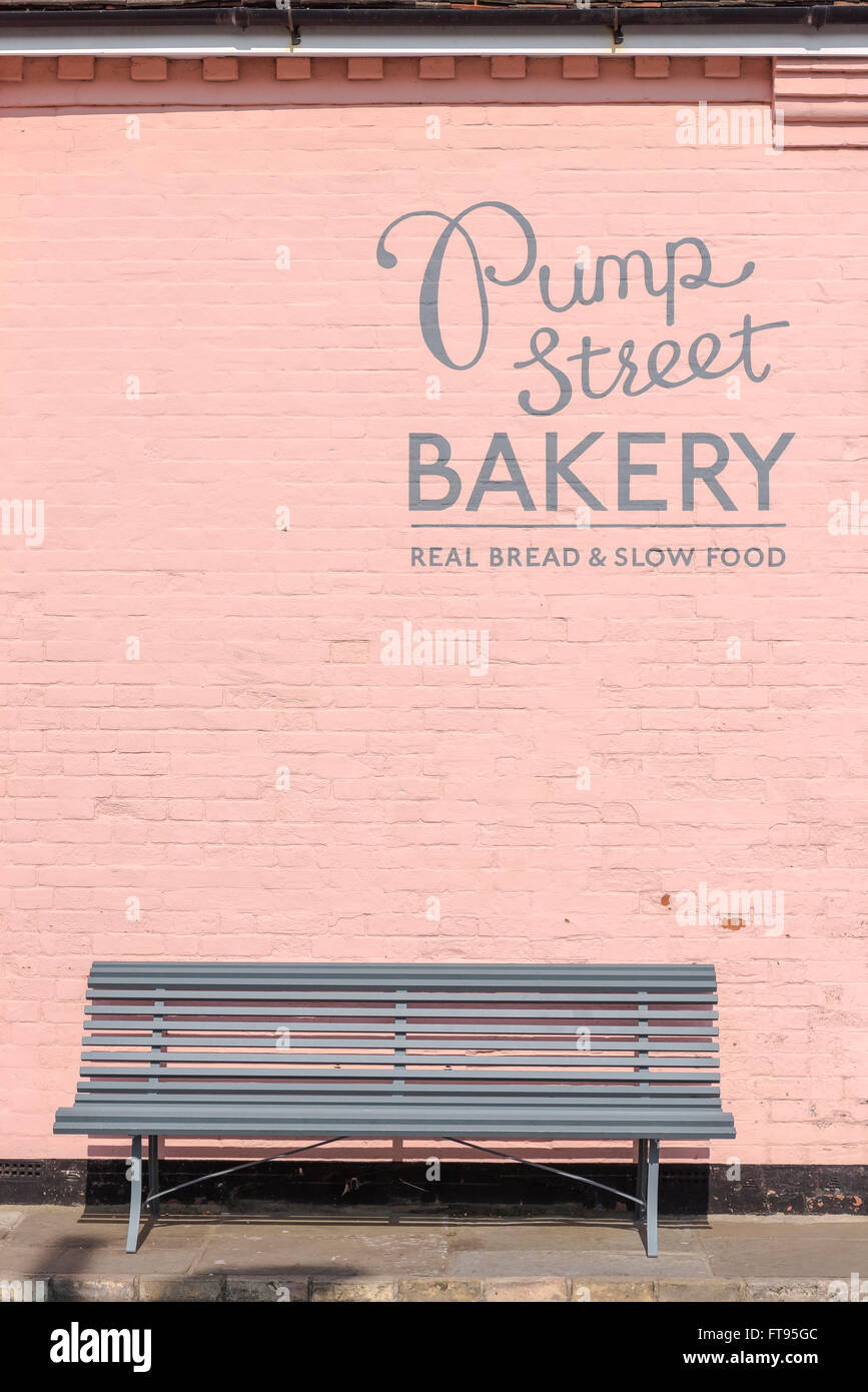 Orford Pump Street Bakery, view of the pink wall and signage of the ...