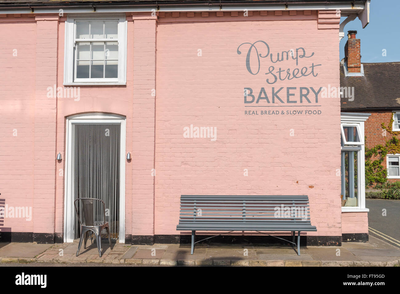 Pump Street Bakery, view of the pink wall and signage alongside the ...