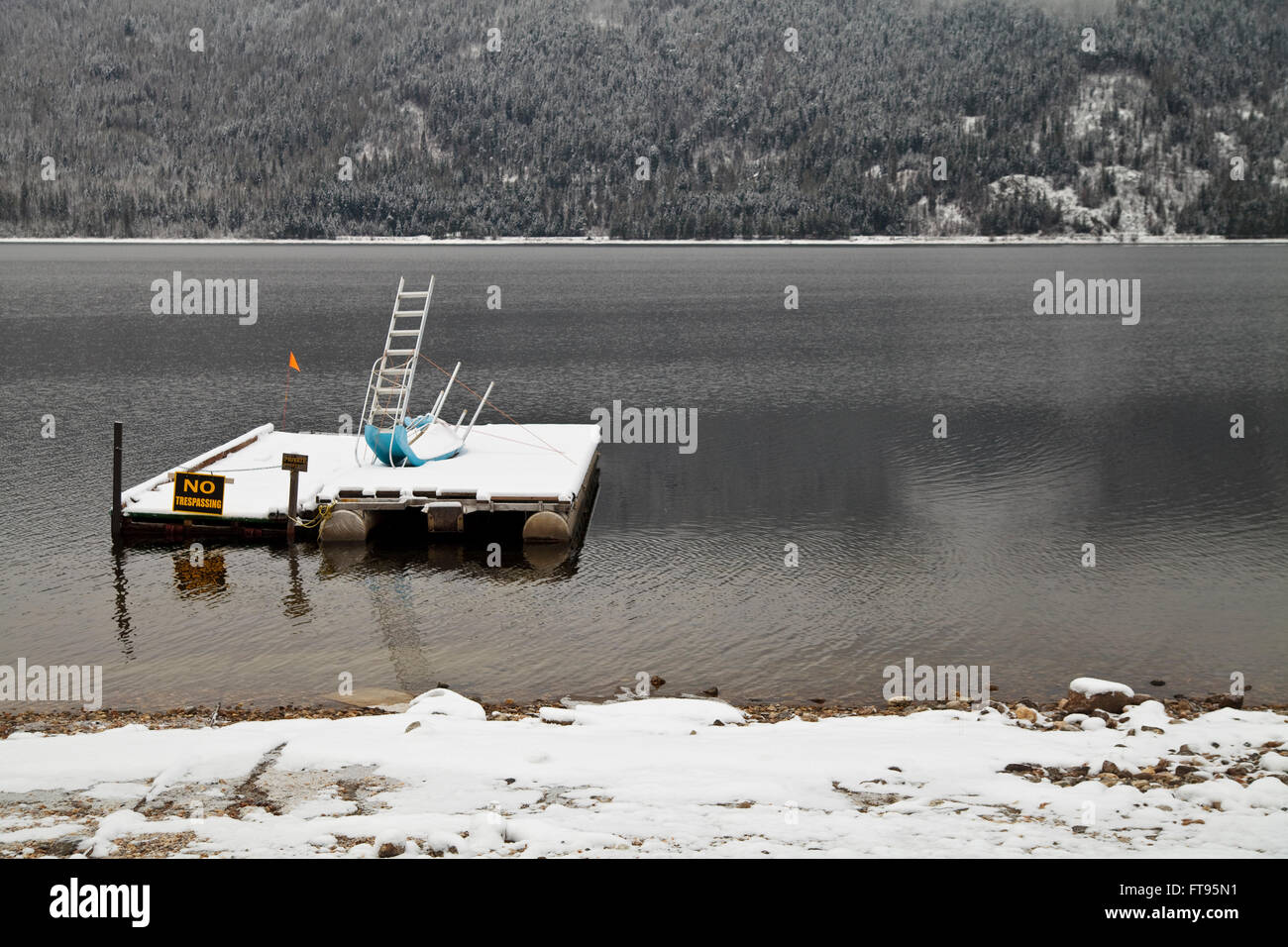 Snow covered raft and diving board Stock Photo - Alamy