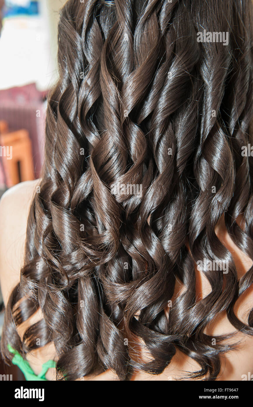 Closeup detail of female womens hair styling being styled at ...