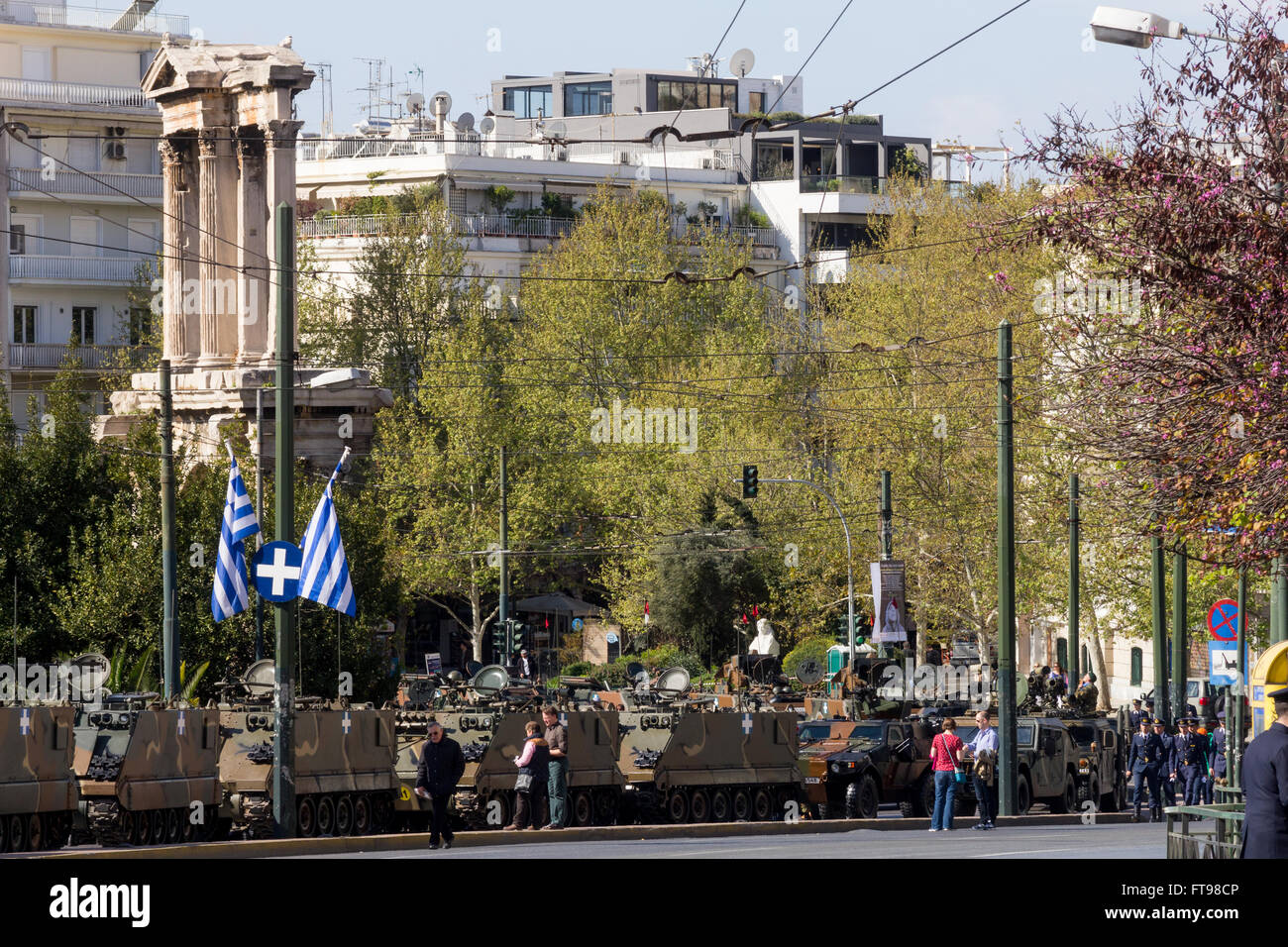 Athens, Greece. 25th Mar, 2016. People watch the military vehicles and ...