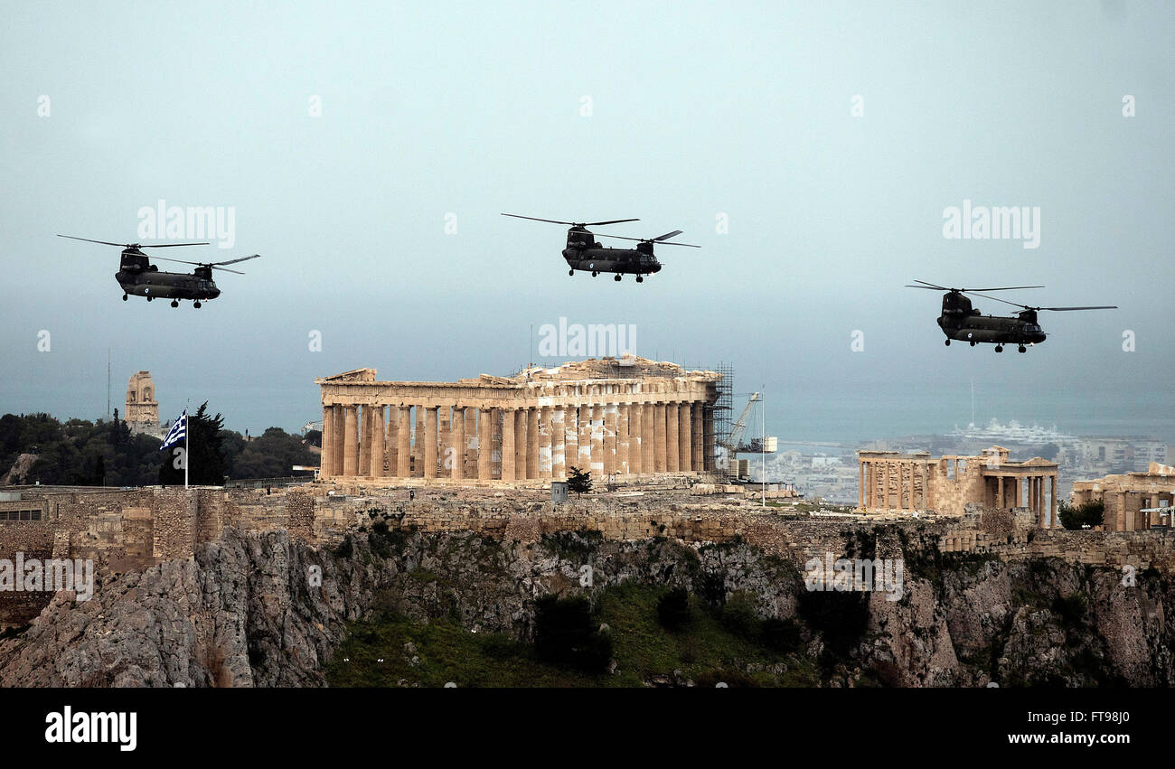Athens, Greece. 25th Mar, 2016. Military helicopters fly over the ...