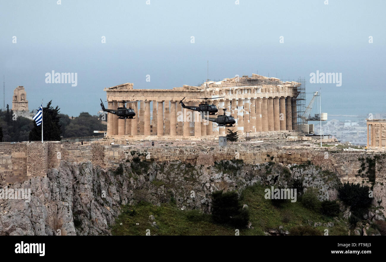 Athens, Greece. 25th Mar, 2016. Military helicopters fly over the ...