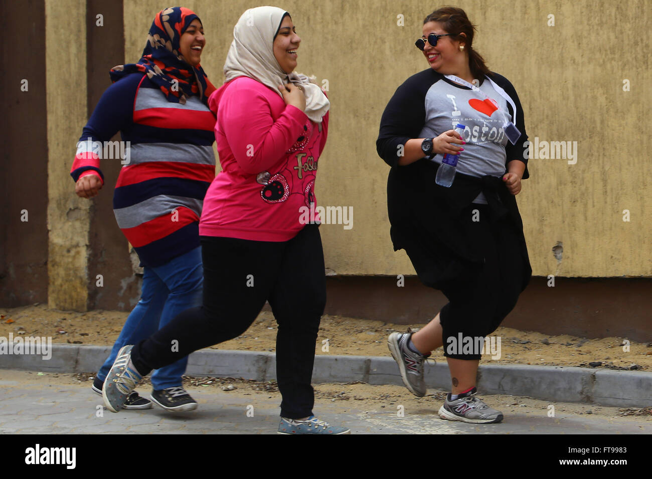 Cairo, Egypt. 25th Mar, 2016. Women run during a marathon for fat women ...