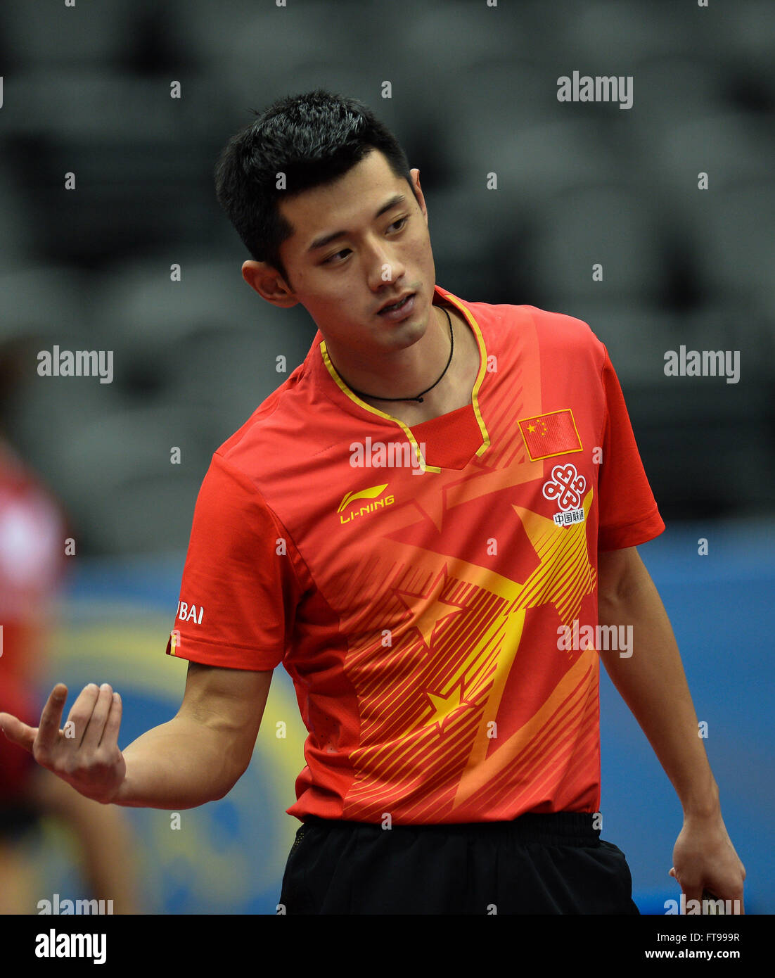 Doha, Qatar. 25th Mar, 2016. Zhang Jike of China reacts during the men ...