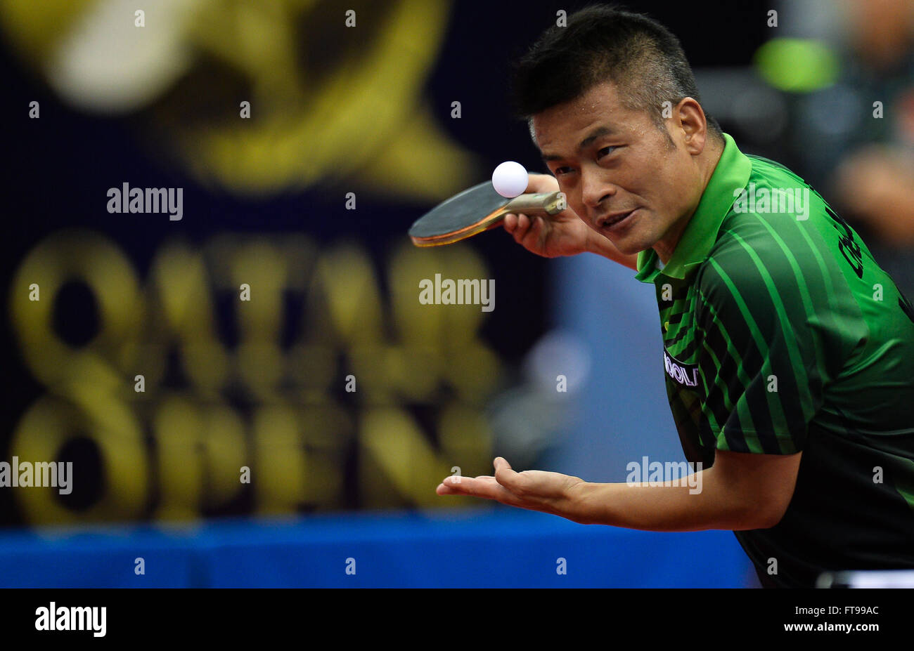 Doha, Qatar. 25th Mar, 2016. Chen Weixing of Austria seves to Zhang ...