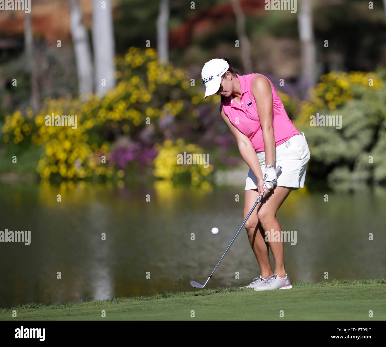 Carlsbad, California, USA. 25th Mar, 2016. Dori Carter chips onto the ...