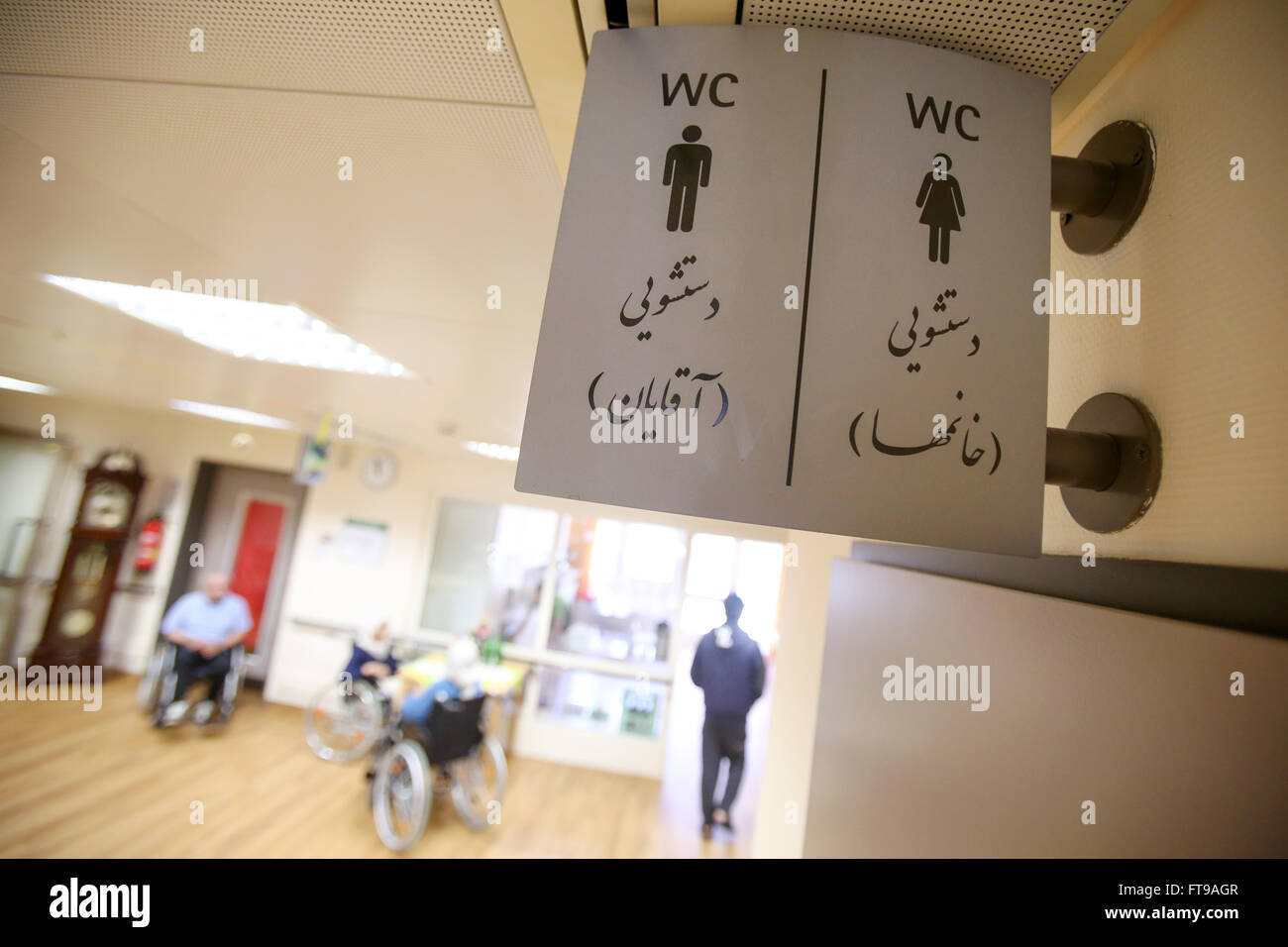 Hamburg, Germany. 23rd Mar, 2016. Arabic-language toilet signs pictured ...