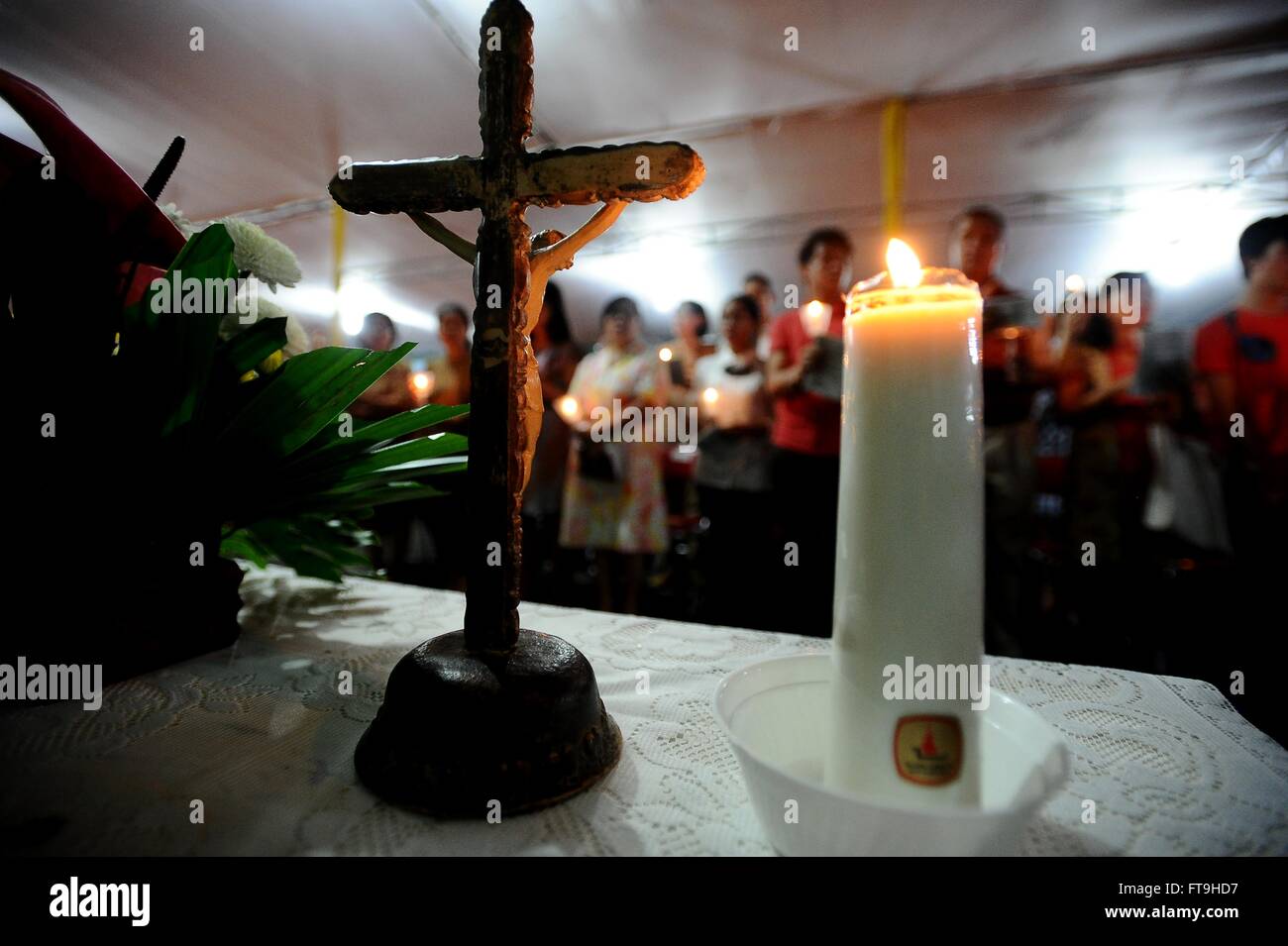 Catholics light candles during easter mass hi-res stock photography and ...