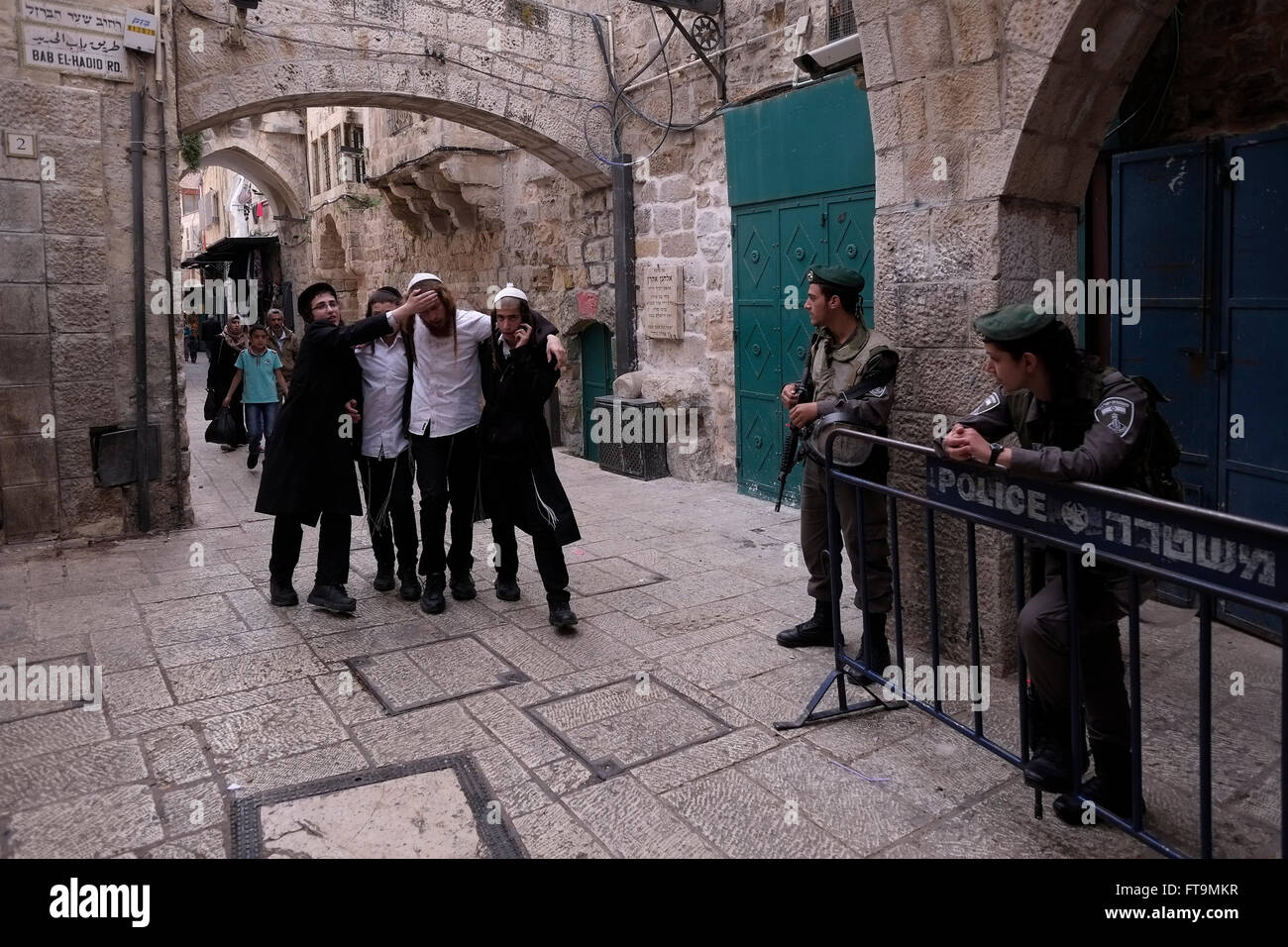 Members of the Israeli Security Forces stand guard as Orthodox Jews ...