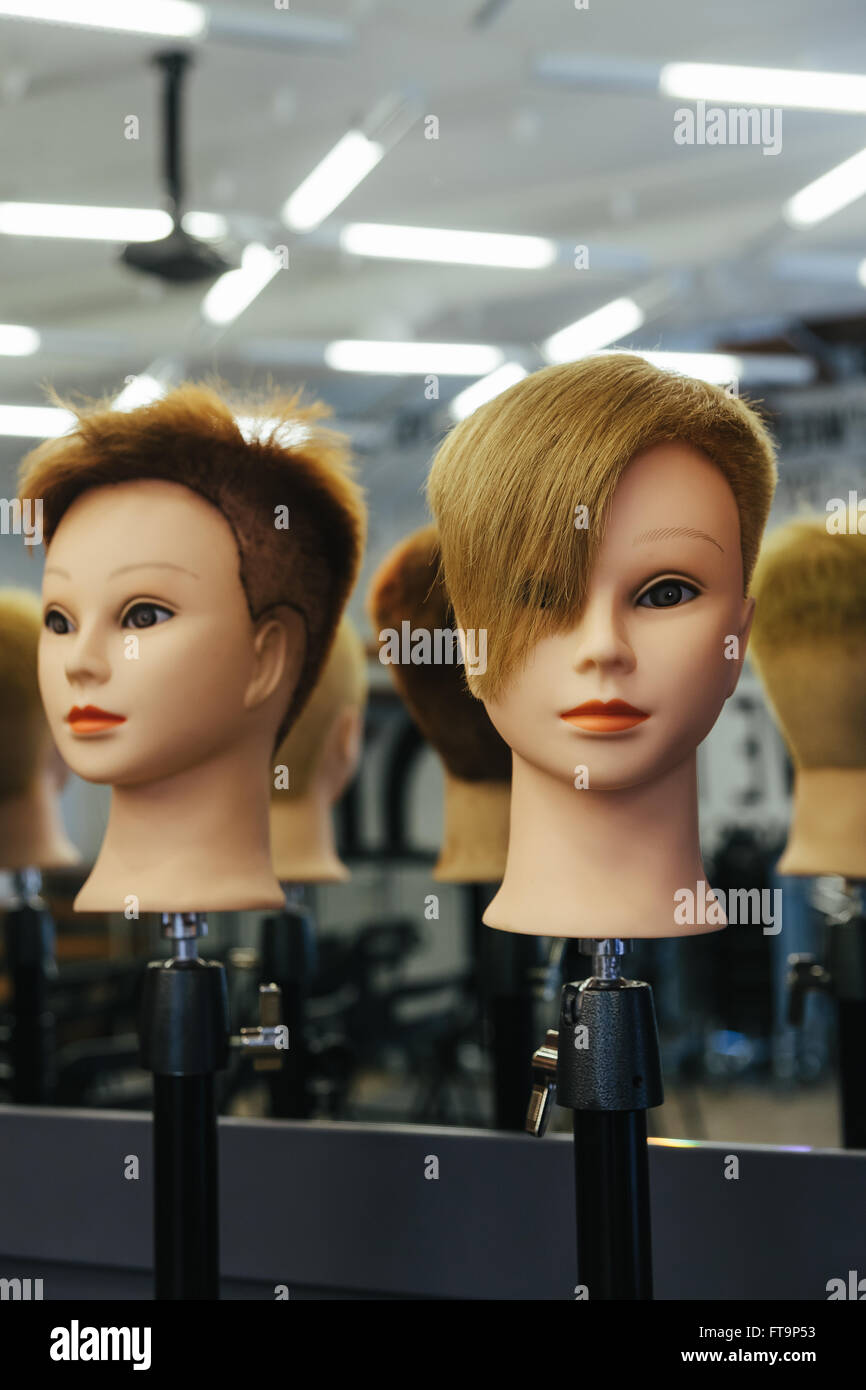 Beautician model heads for practicing beauty techniques in beauty ...