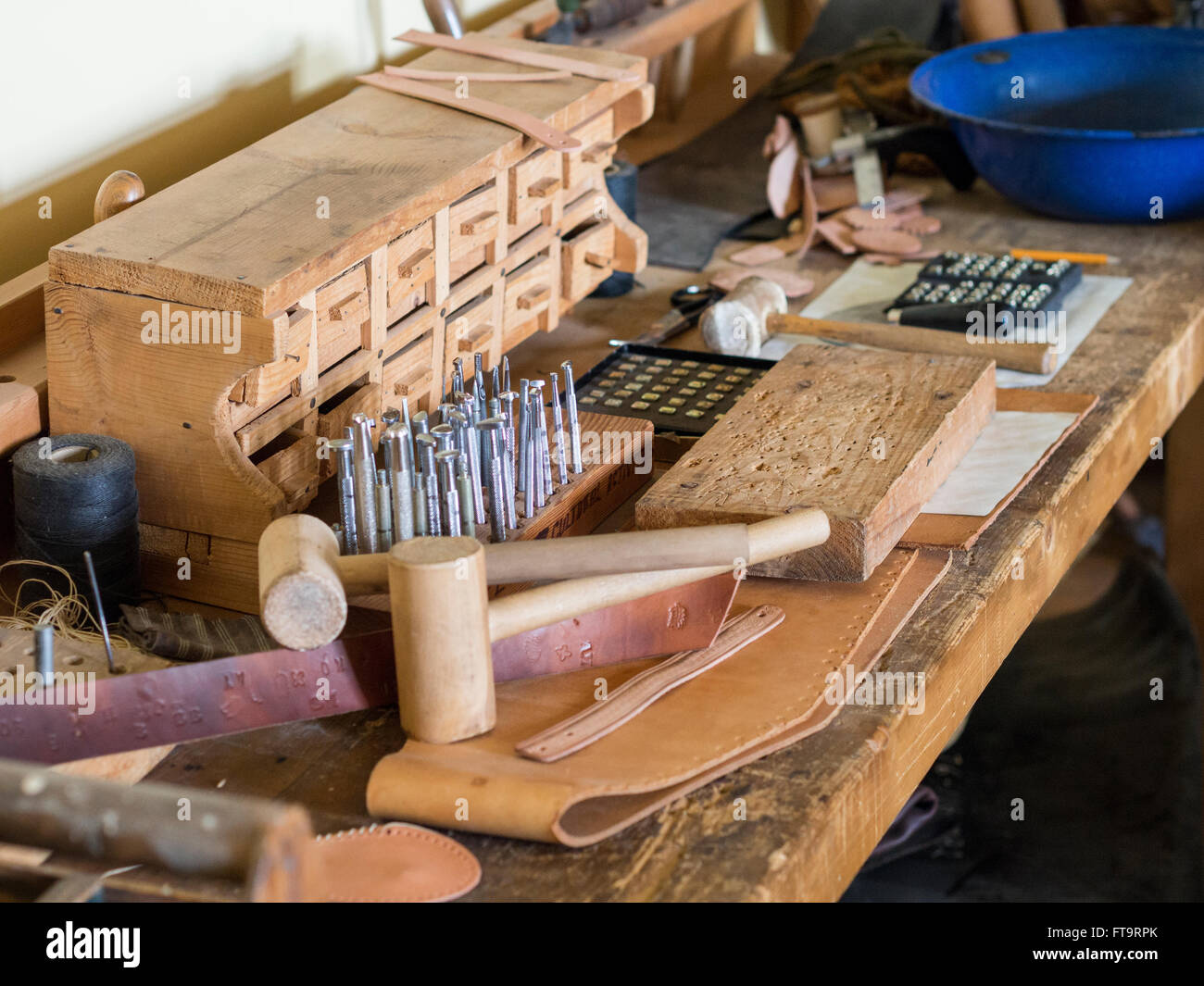 Cobbler's Workbench. A wooden work bench of an old time cobbler. Fort ...