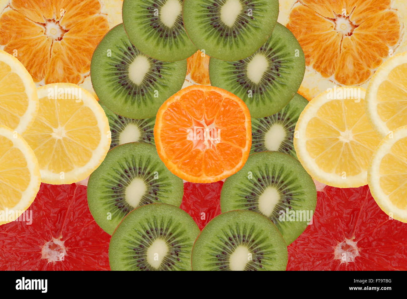 Composition made of slices of tropical fruits Stock Photo - Alamy