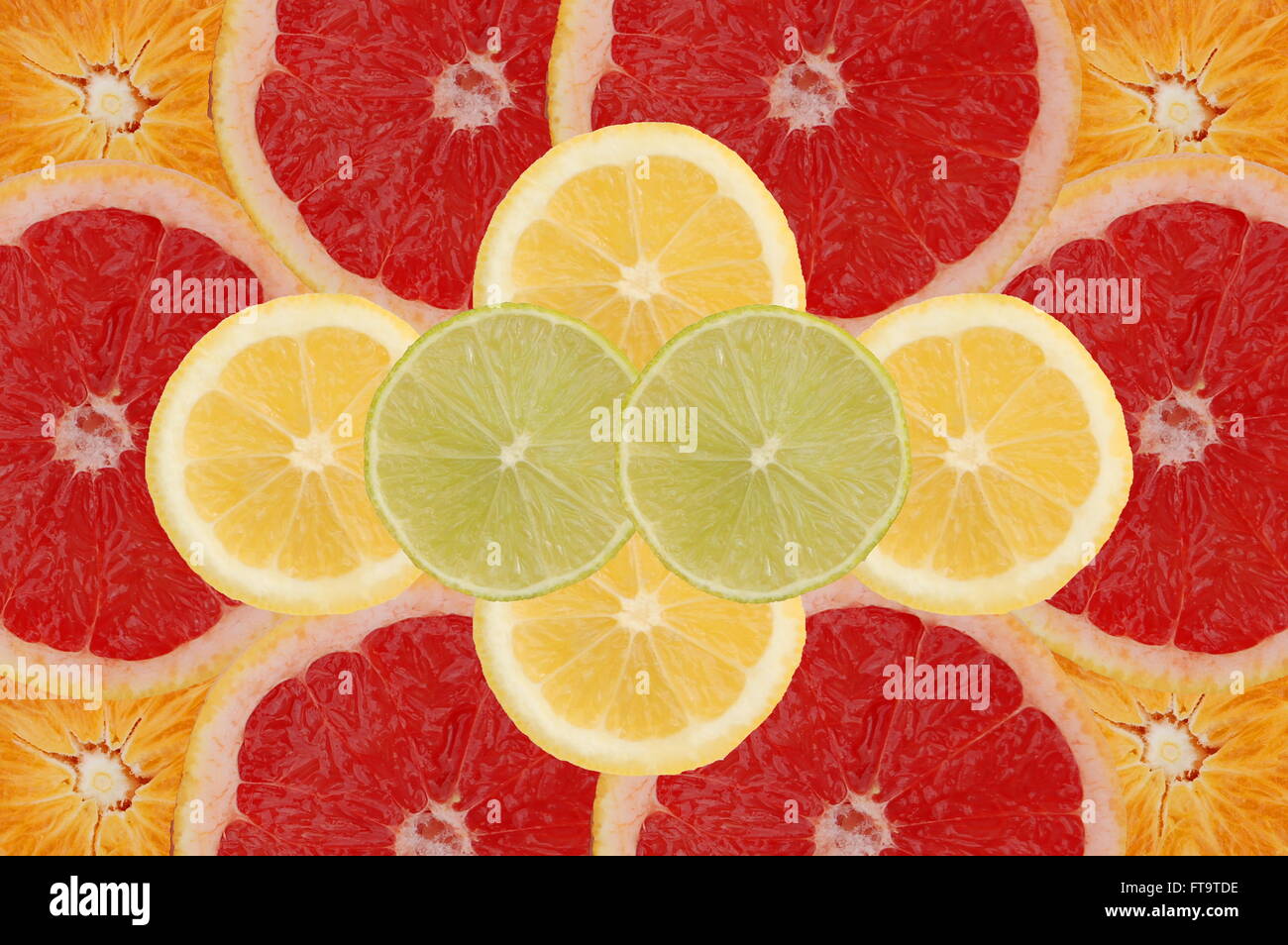 Composition made of slices of tropical fruits Stock Photo - Alamy