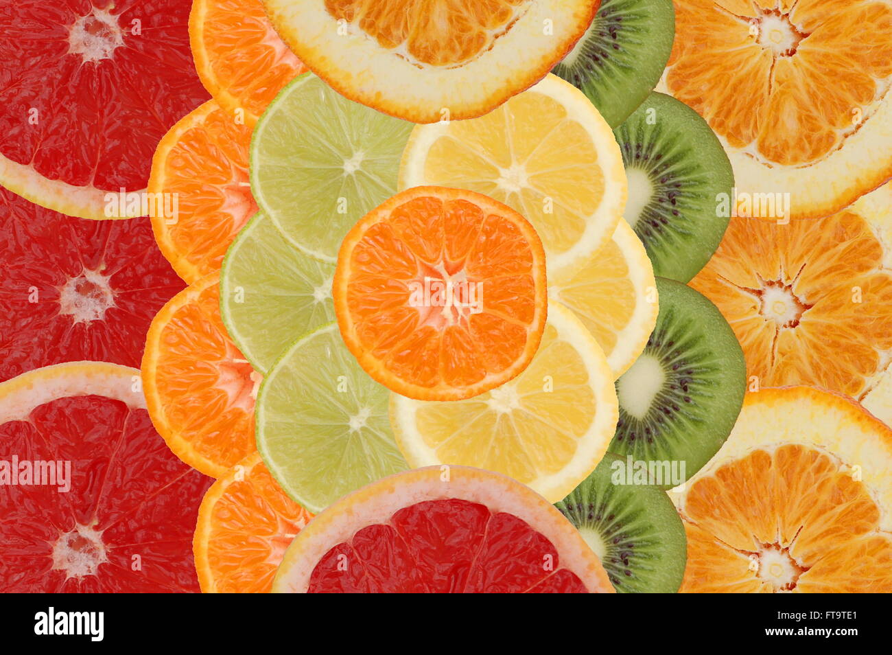 Composition made of slices of tropical fruits Stock Photo - Alamy