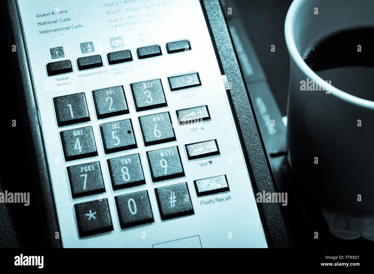 Contact us concept with telephone and cup of coffee Stock Photo - Alamy