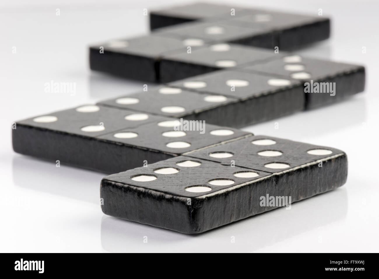 Composition of lying black domino bricks with white dots Stock Photo ...