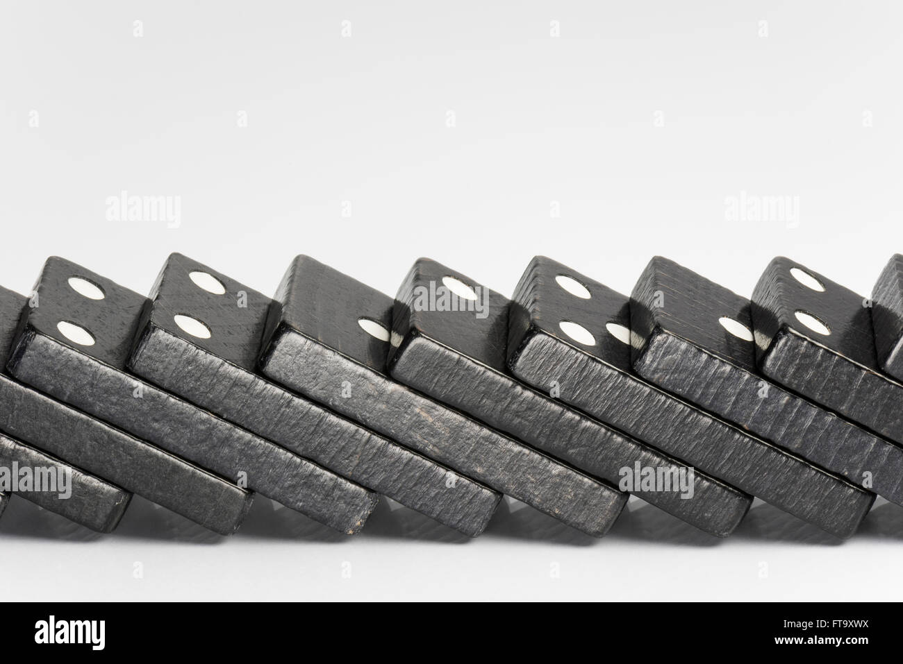Black domino hi-res stock photography and images - Alamy