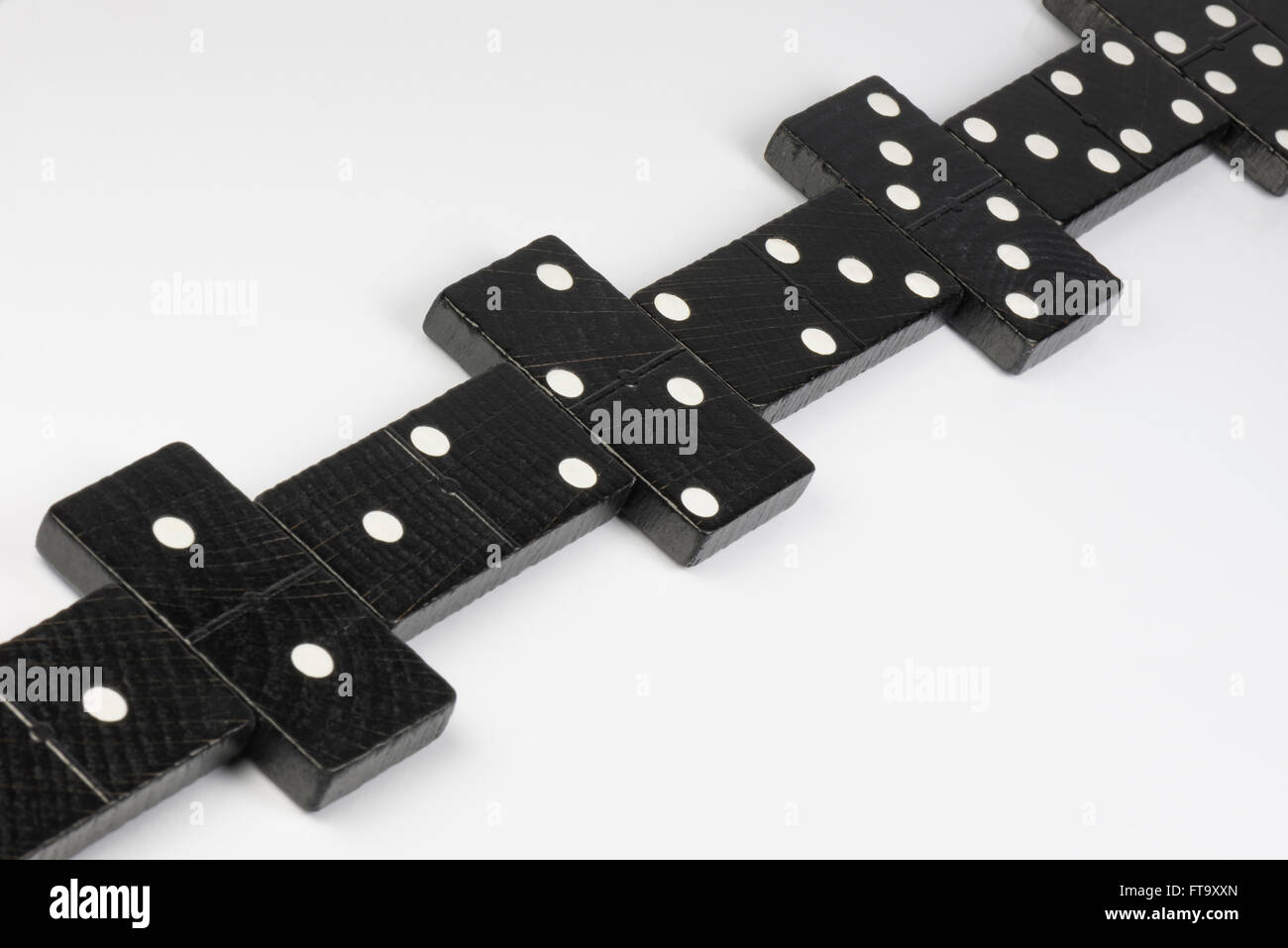 Composition of lying black domino bricks with white dots Stock Photo ...