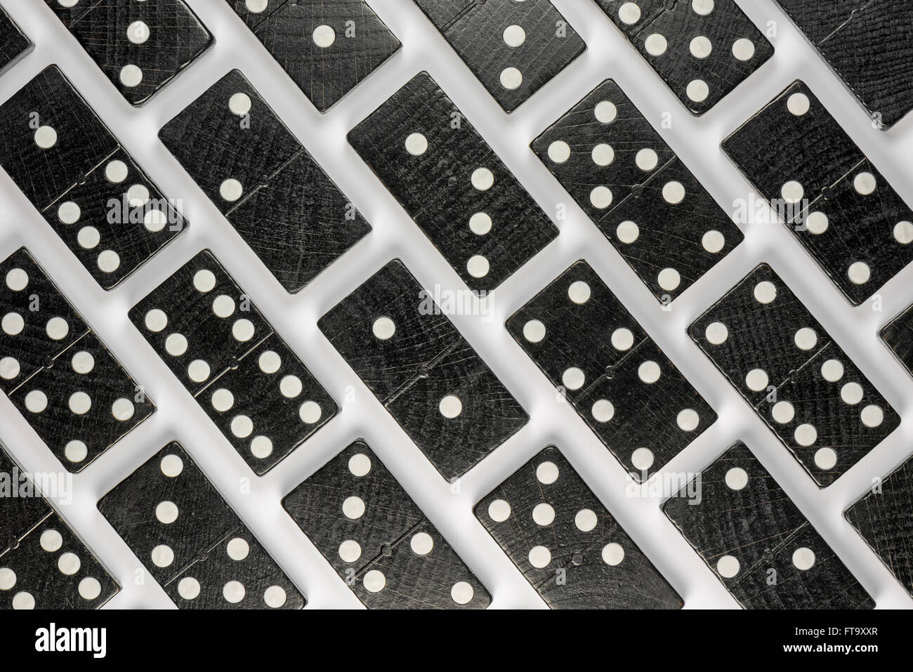 Composition of lying black domino bricks with white dots Stock Photo ...