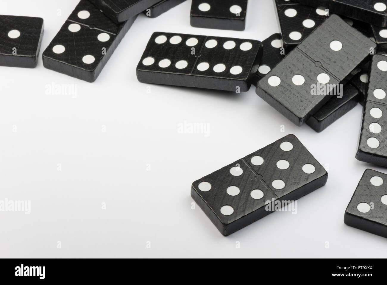 Composition of lying black domino bricks with white dots Stock Photo ...