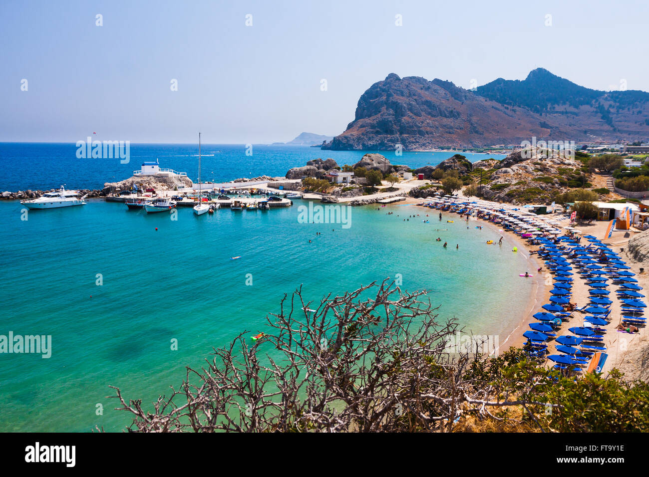 Kolymbia beach with the rocky coast in Greece Stock Photo - Alamy