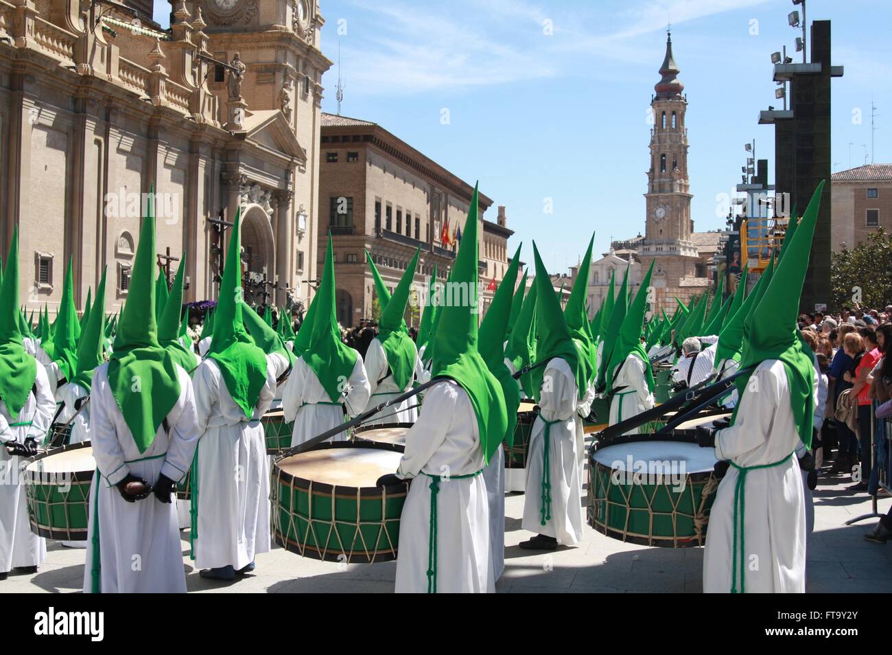 Catholic penitents with a religious brotherhood wear traditional pointy ...