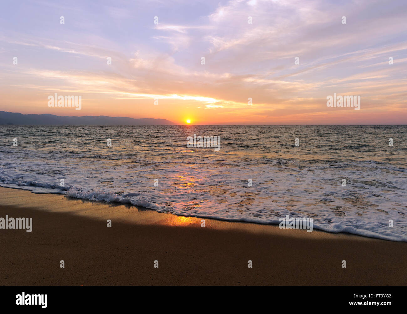 Ocean sunset is brightly light golden seascape with a gentle wave ...