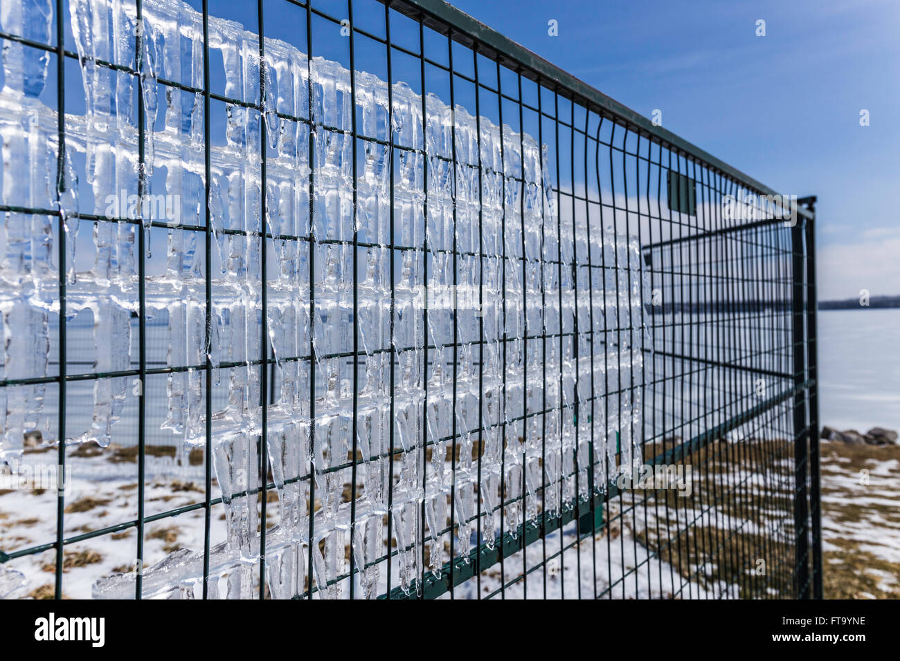 Fence with icicles hi-res stock photography and images - Alamy