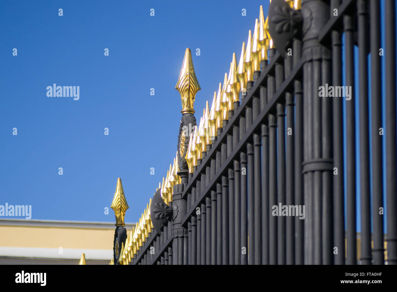 Wrought iron gate with gold leaf hi-res stock photography and images ...