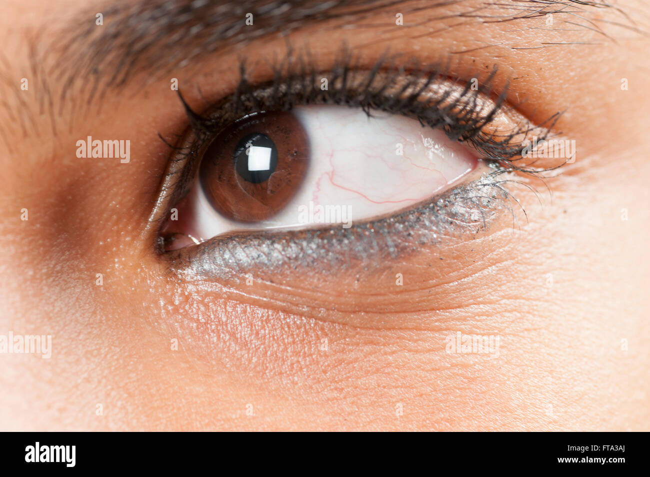 Close up of a young woman's eye looking away Stock Photo - Alamy