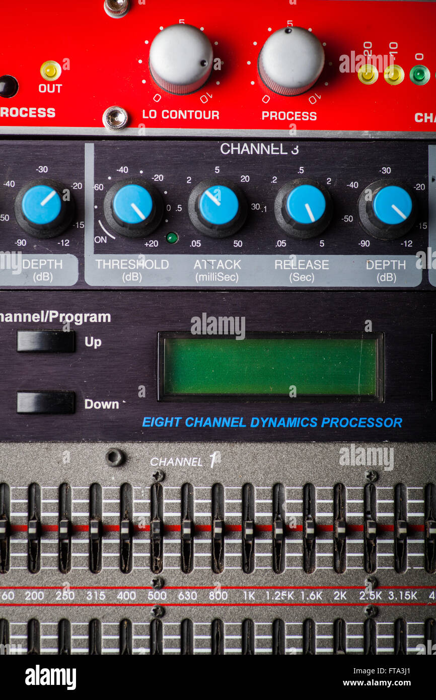 Color image of many buttons on a sound mixer in a recording studio ...