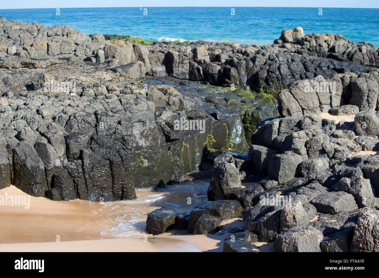 Indian Ocean waves hitting basalt rocks at Ocean Beach Bunbury Western ...
