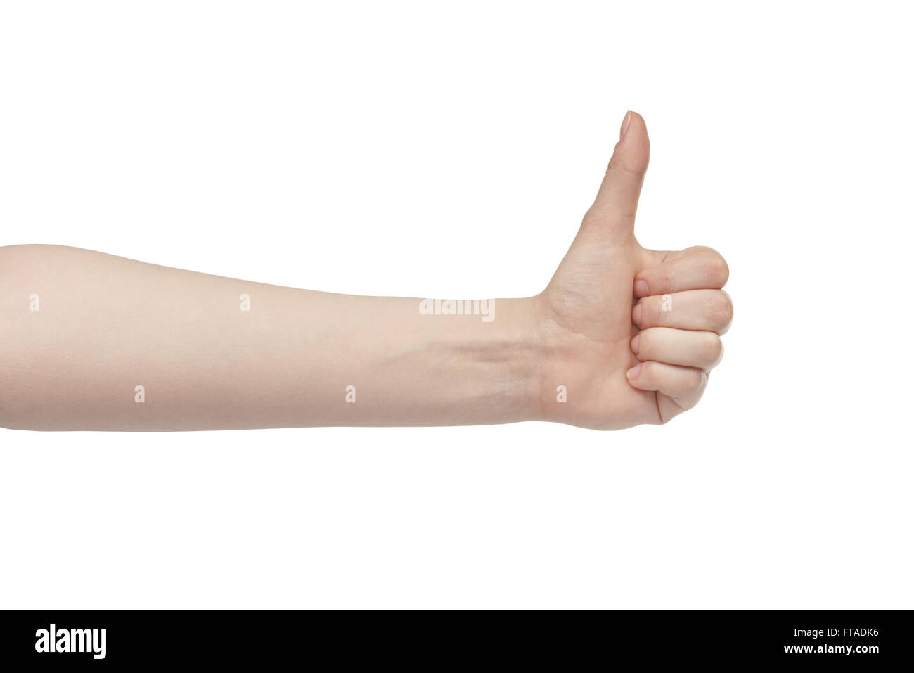 young woman left hand shows thumb up gesture Stock Photo - Alamy