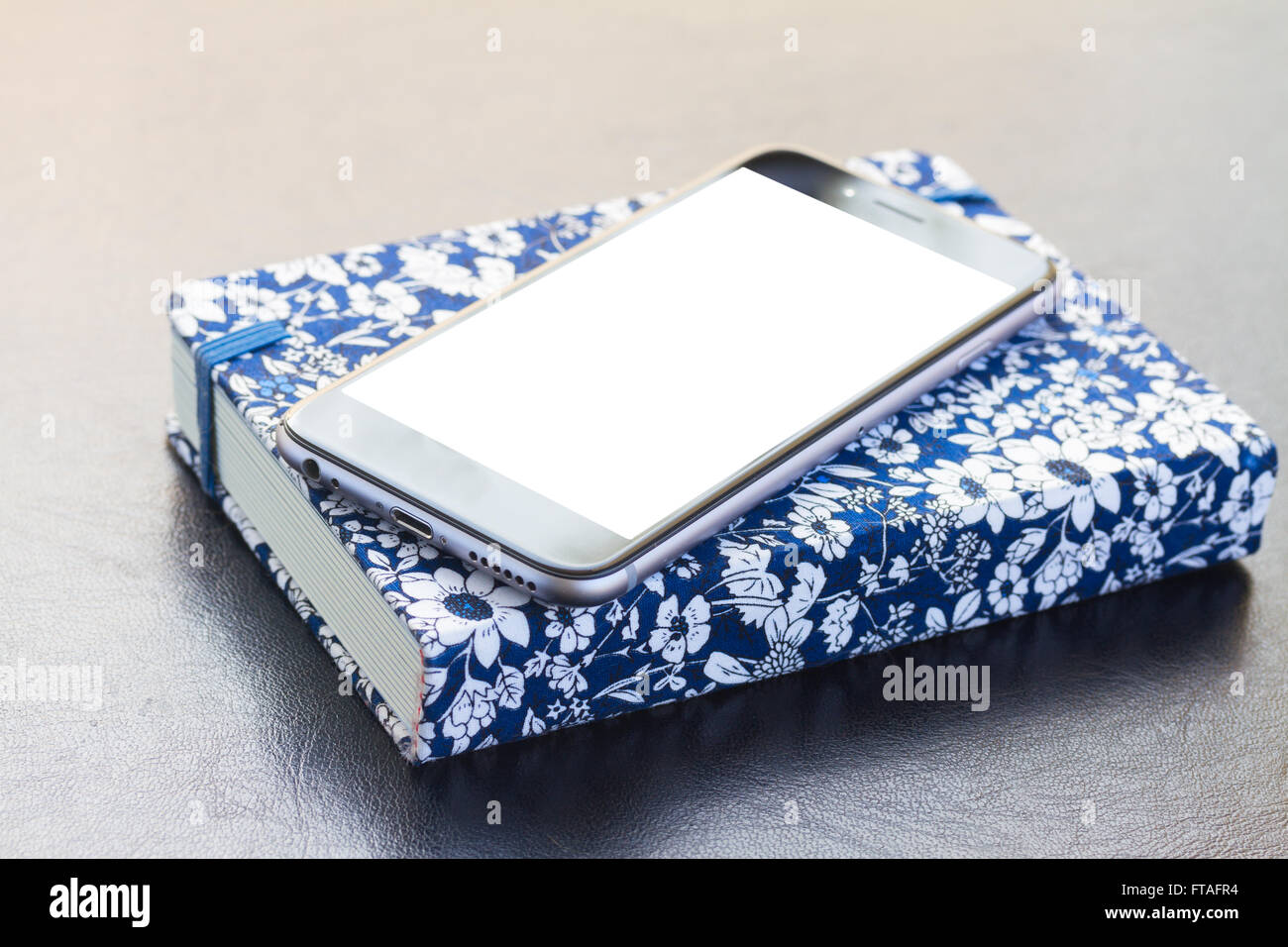 phone and notebooks Stock Photo - Alamy