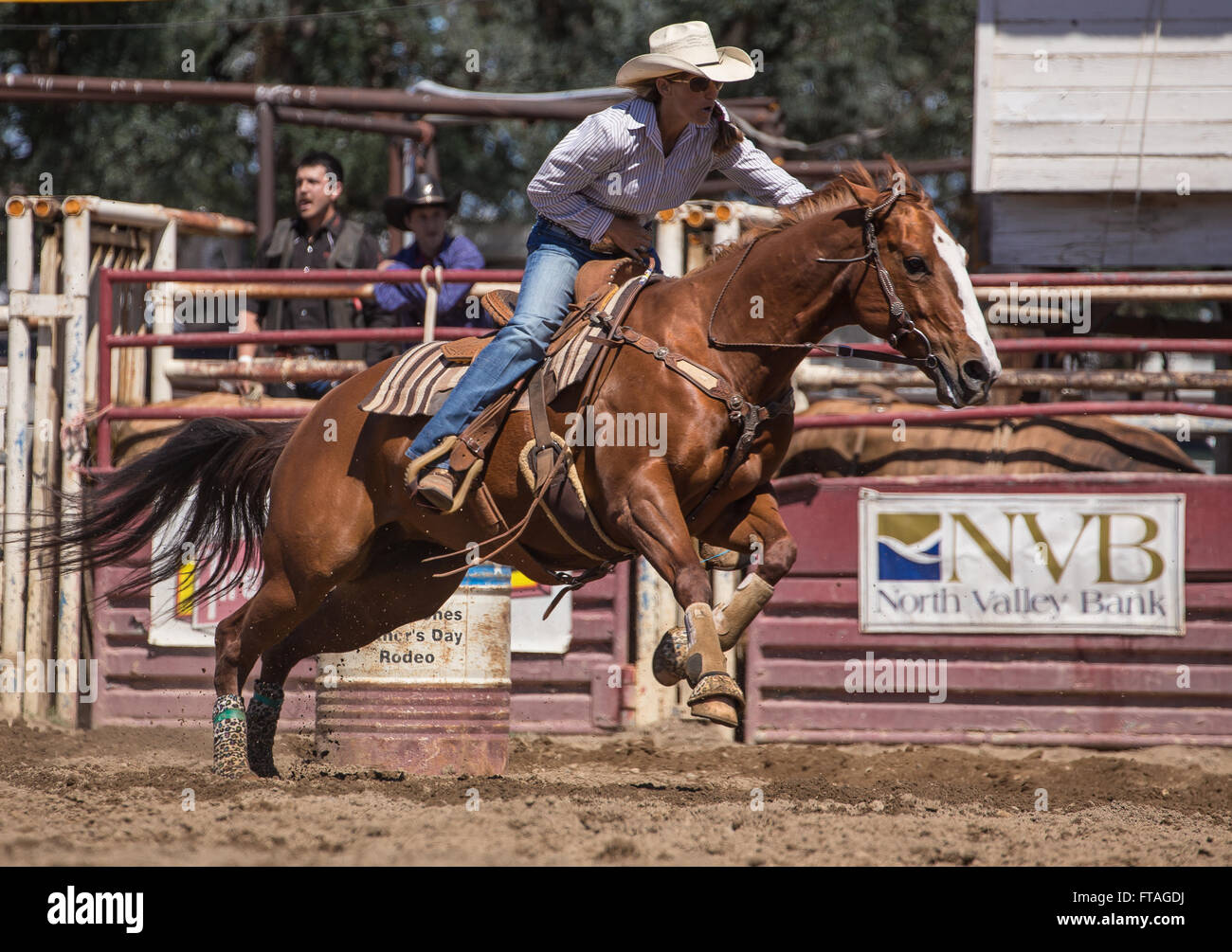 Barrel racing action at a rodeo in Cottonwood, California Stock Photo ...