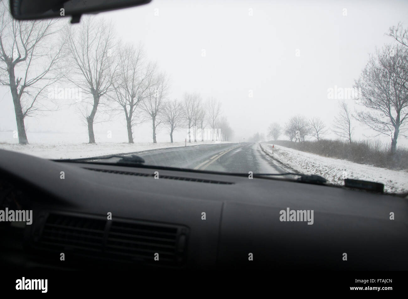 Winter Driving - Winter Road, inside the car Stock Photo - Alamy