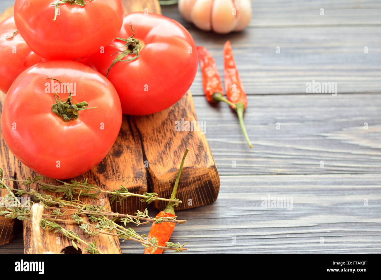 Table with tomatoes hi-res stock photography and images - Alamy