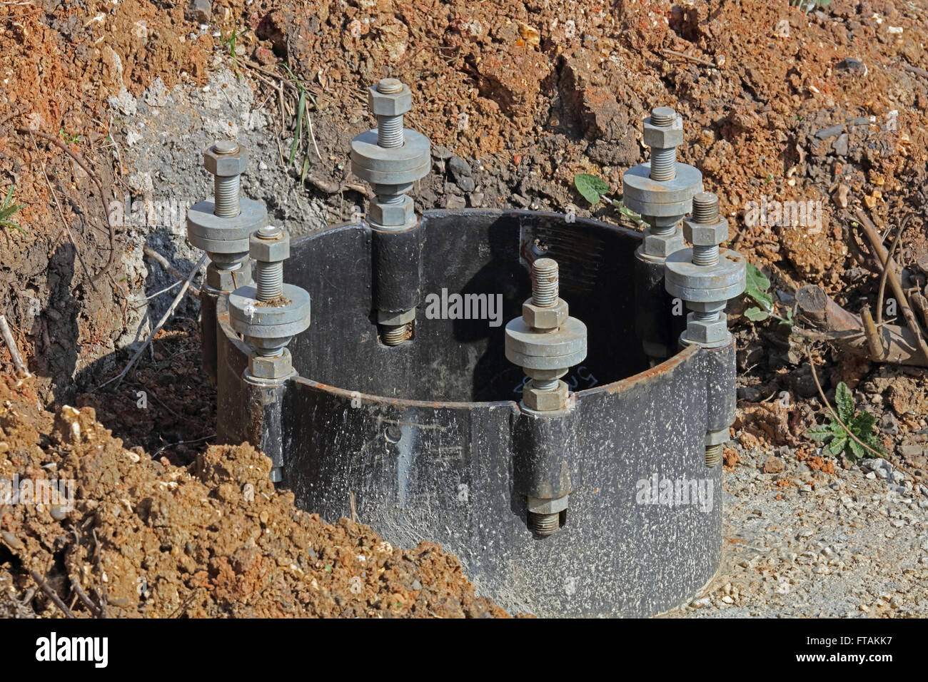 A very heavy duty steel piling tube piled into the ground to form the ...