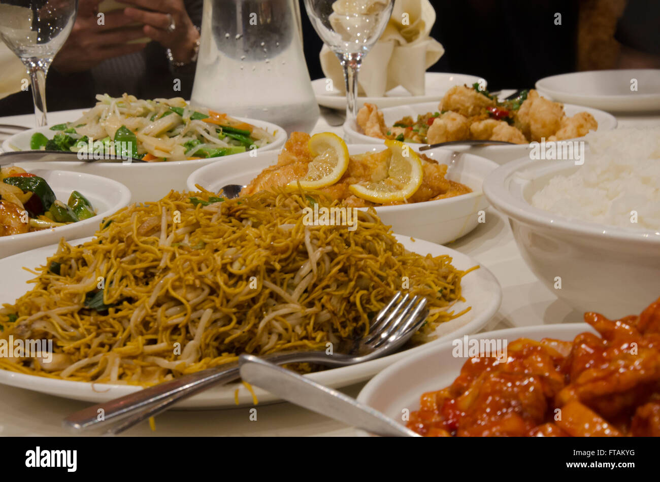 Plates of food in a Chinese restaurant Stock Photo - Alamy