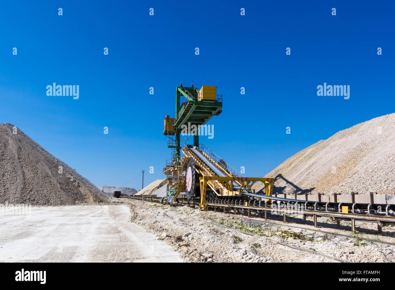warehouse production in quarry blue clay, huge machines for stacking ...